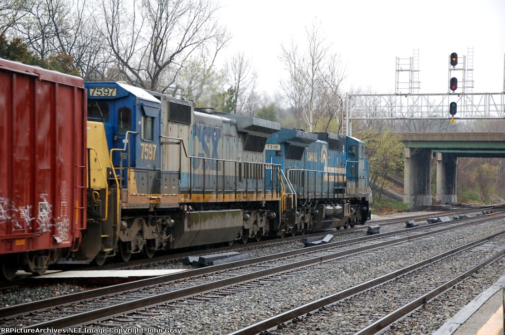 Q411-11 off the Old Main Line with a Conrail leader -CSXT 7319(C40-8W) ex-CR 6095(C40-8W) & CSXT ...
